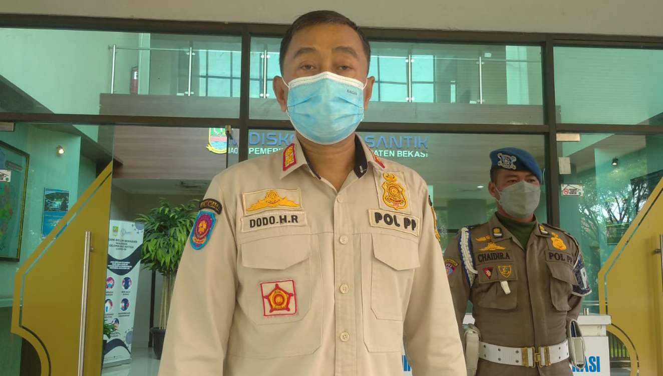 Satpol PP Kabupaten Bekasi Dikerahkan Cegah Kerumunan Malam Tahun Baru Satpol PP Kabupaten Bekasi Dikerahkan Cegah Kerumunan Malam Tahun Baru